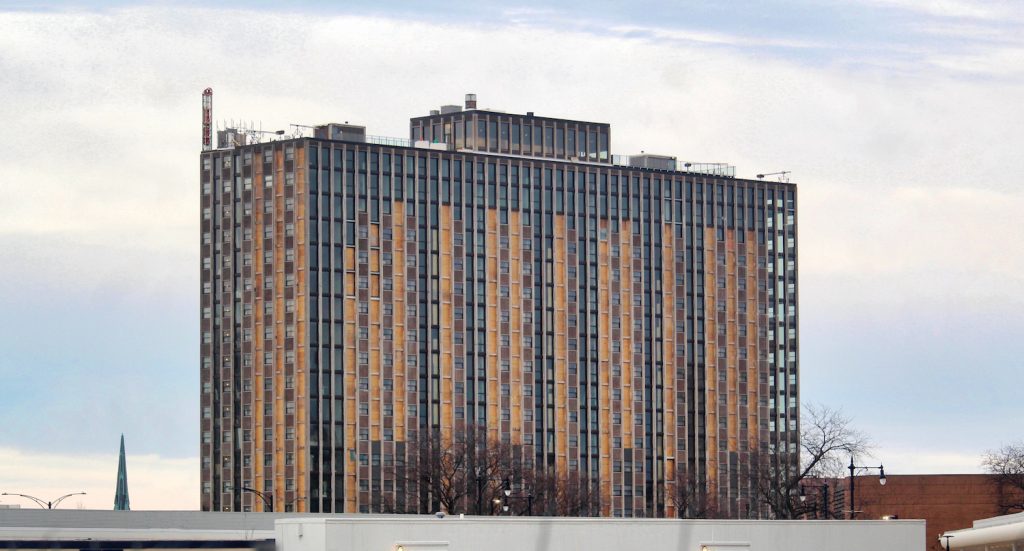 Recladding Continues on Atrio Apartments Renovation in Illinois Medical ...