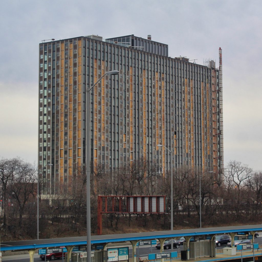 Recladding Continues on Atrio Apartments Renovation in Illinois Medical ...