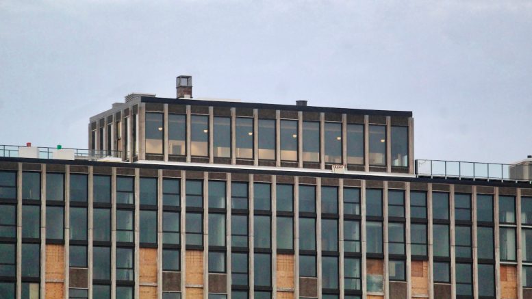 Recladding Continues on Atrio Apartments Renovation in Illinois Medical ...