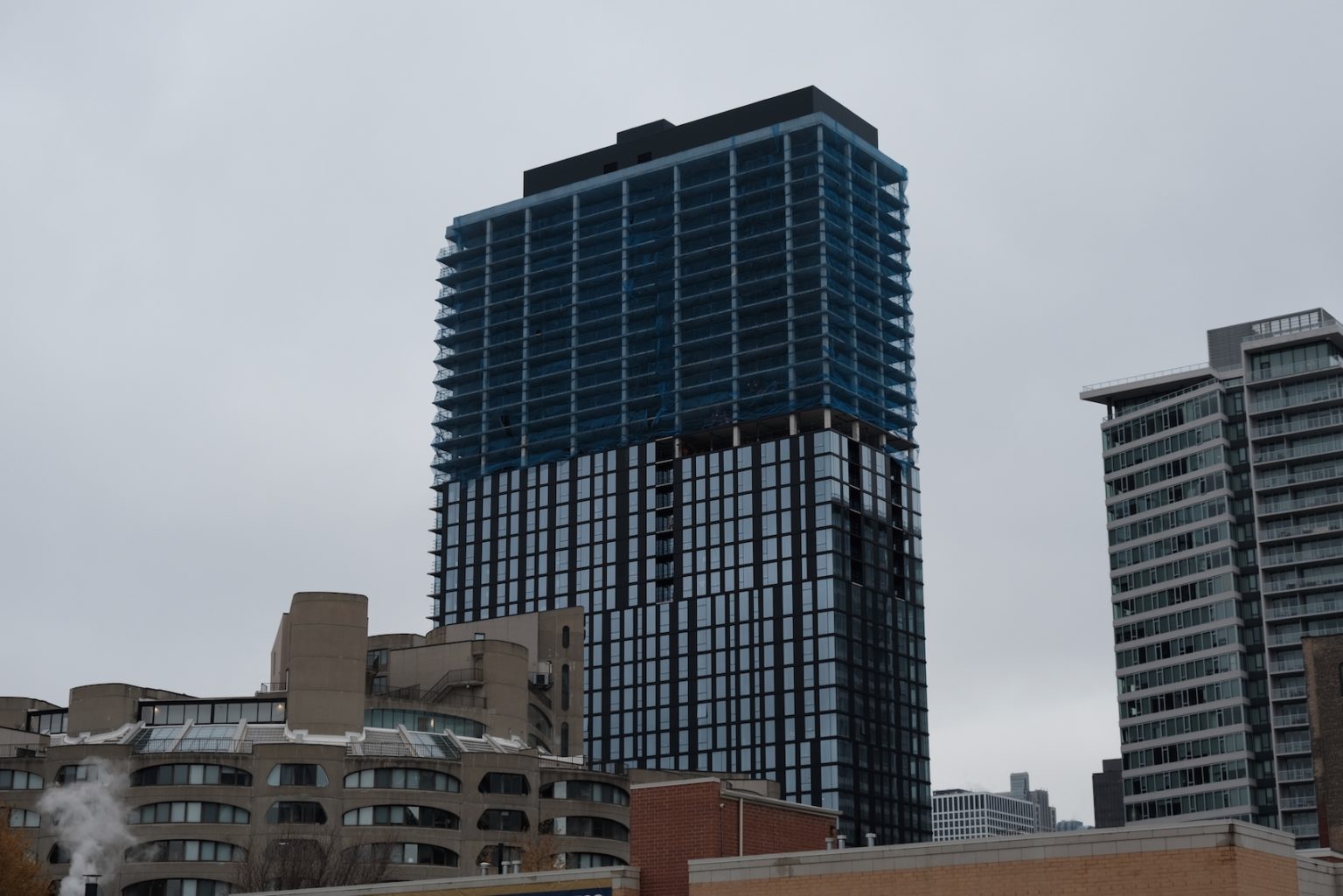 Facade Work Continues Climb for The Reed in South Loop - Chicago YIMBY