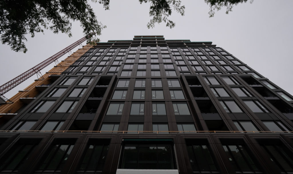 Facade Approaches Roof Height for Embry Condo Development in West Loop ...