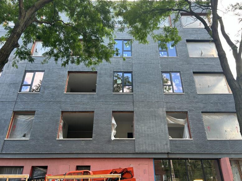 Topped-out residential development at 6044 North Winthrop Avenue now ...