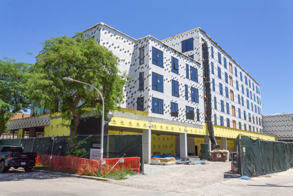 Windows are in at topped-out Roosevelt Square Phase 3B in Little Italy ...
