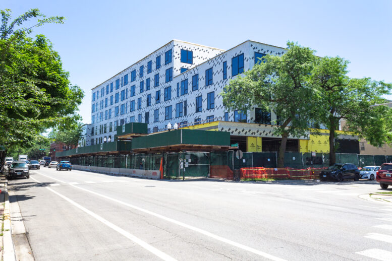 Windows are in at topped-out Roosevelt Square Phase 3B in Little Italy ...