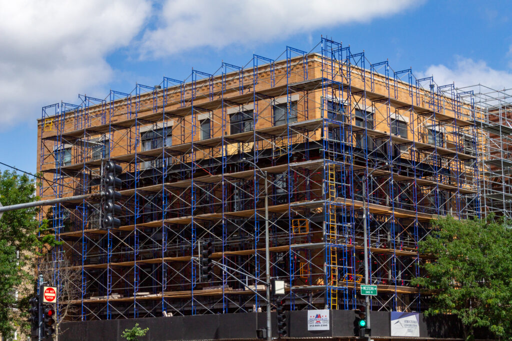 Scaffolding shrouds Western Avenue condo building as balcony work ...