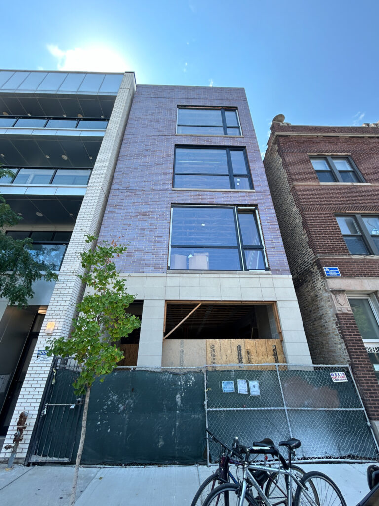 Four-story condominium building rises on former Toast site in Bucktown ...
